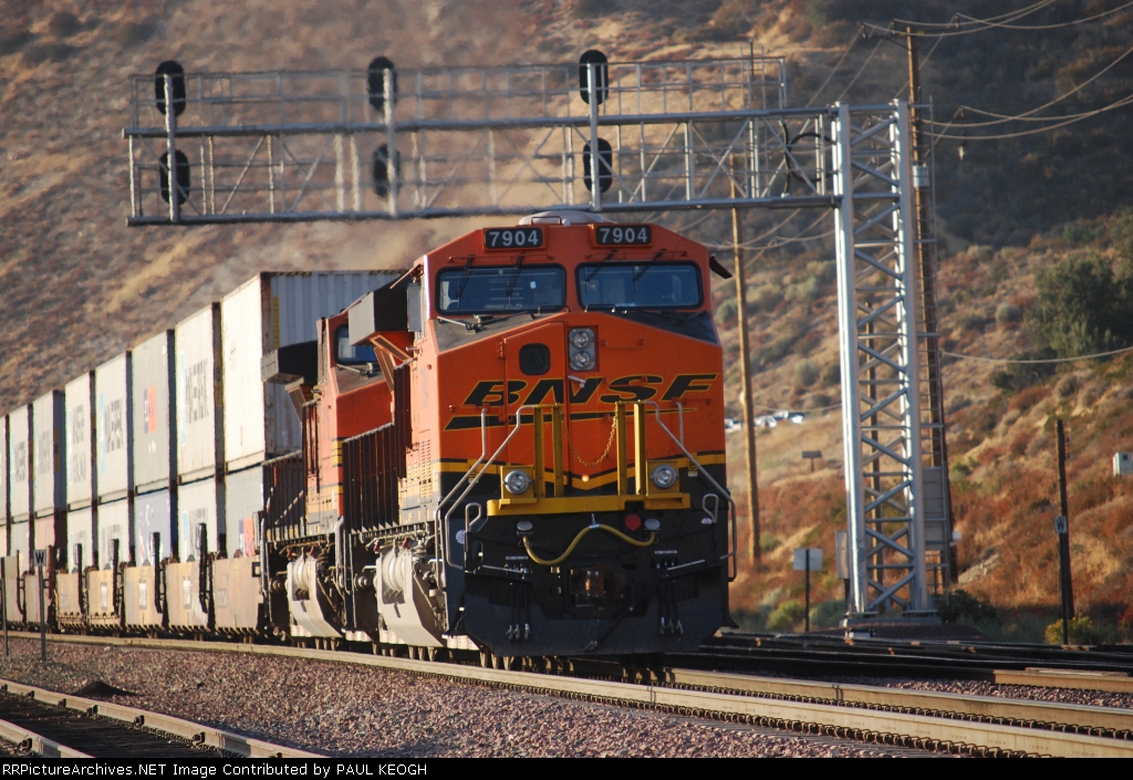 BNSF 7904 moves away from me as the heat rises from her exhaust stack and is caught in the ...
